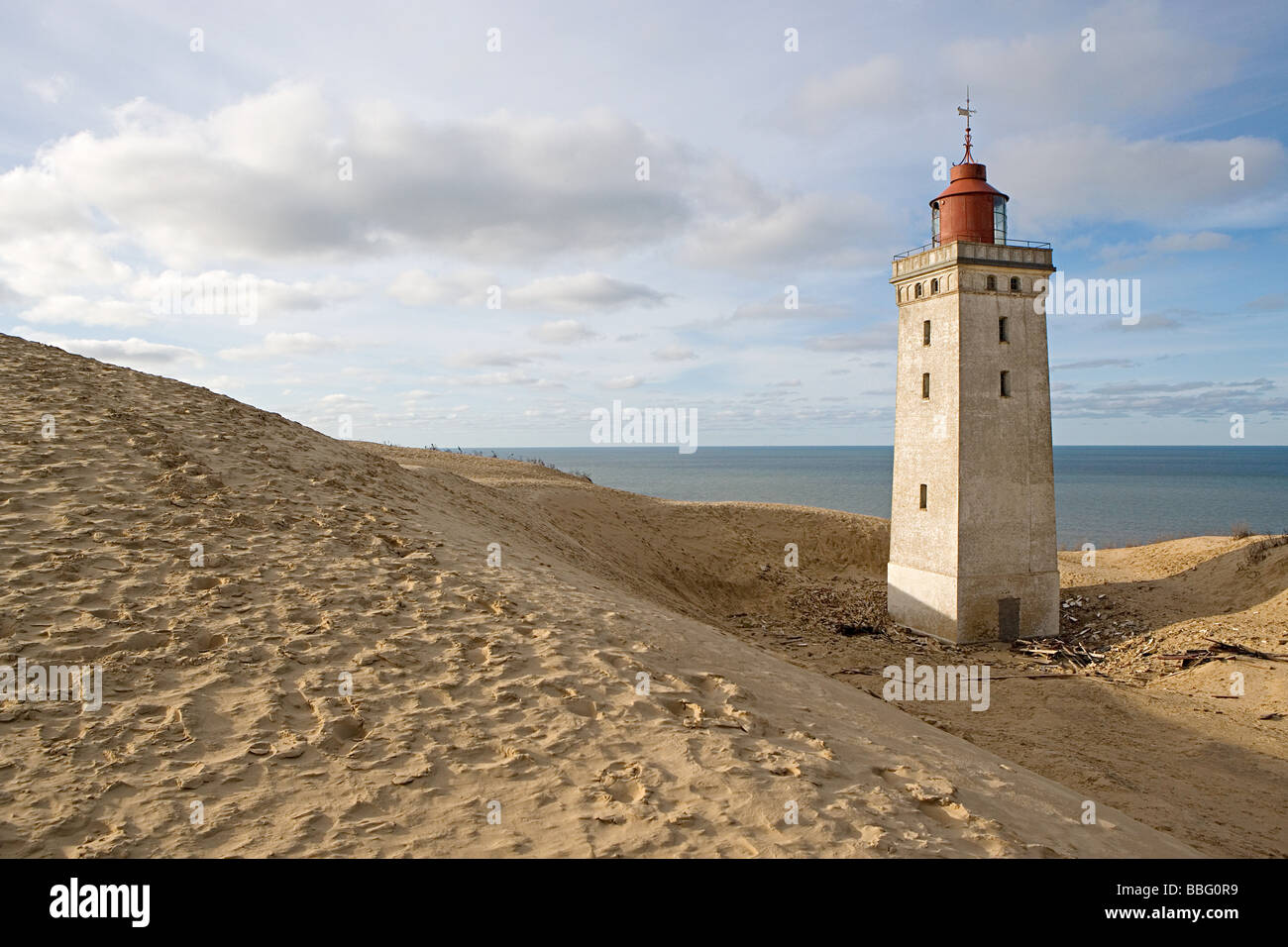 Lighthouse on a beach hi-res stock photography and images - Alamy