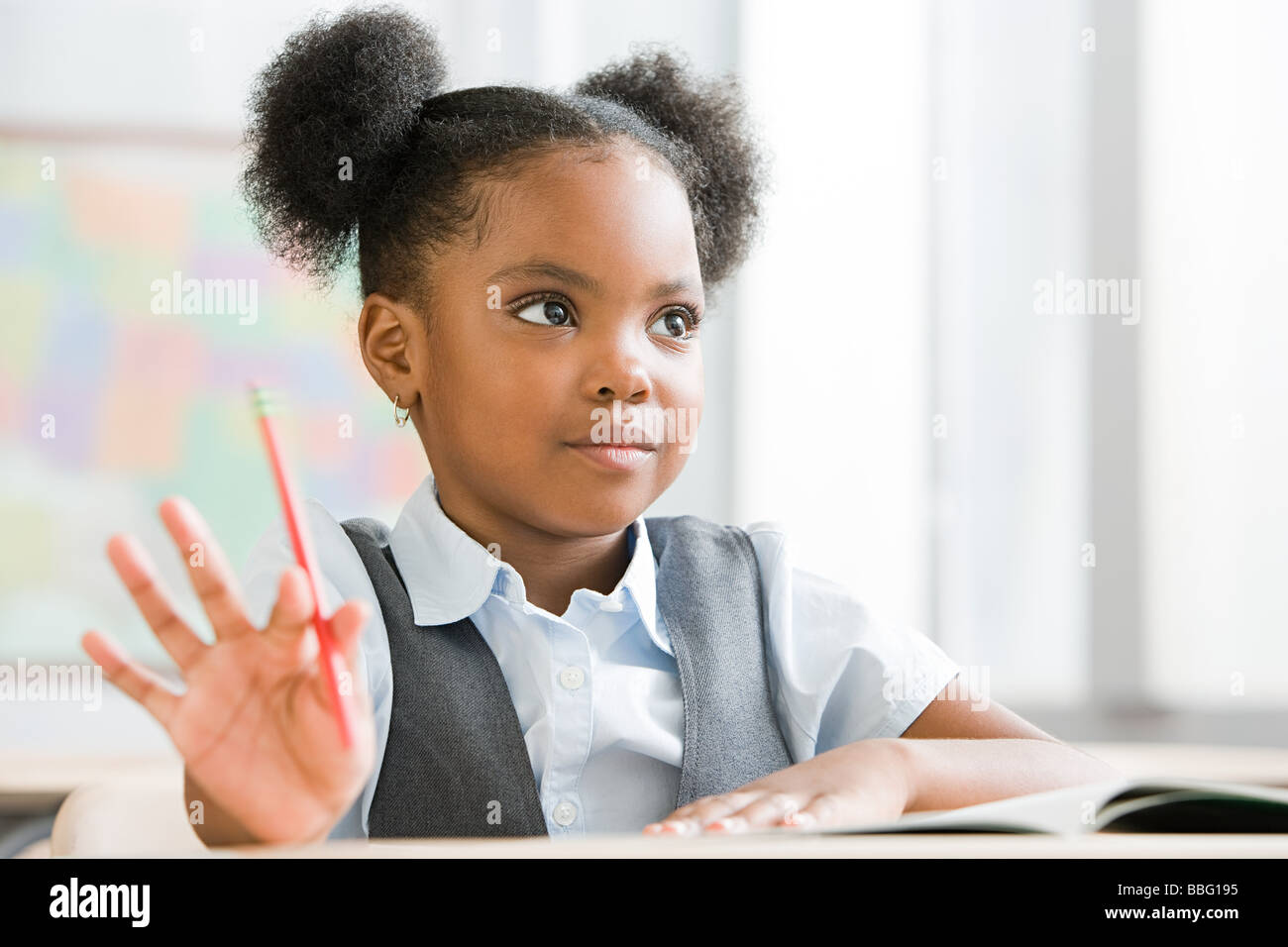 Schoolgirl in class Stock Photo - Alamy