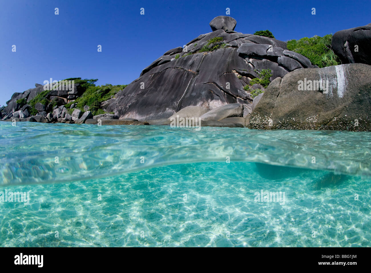 Clear water and island Stock Photo - Alamy