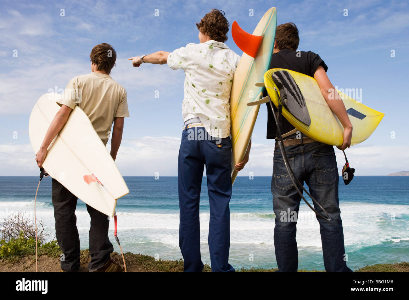 Three surfers hi-res stock photography and images - Alamy