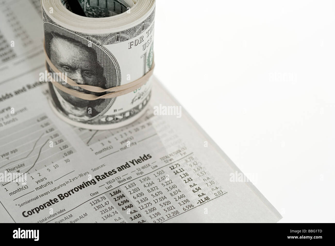 Banknotes on newspaper Stock Photo - Alamy