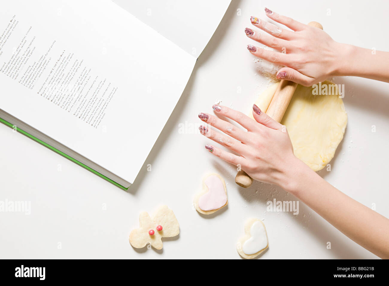 Woman making biscuits Stock Photo - Alamy