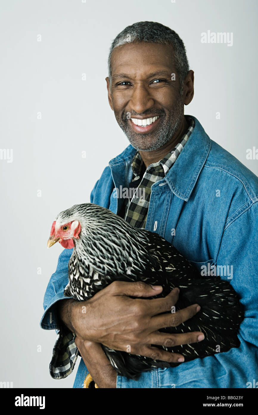Farmer, chicken, ethnic hi-res stock photography and images - Alamy