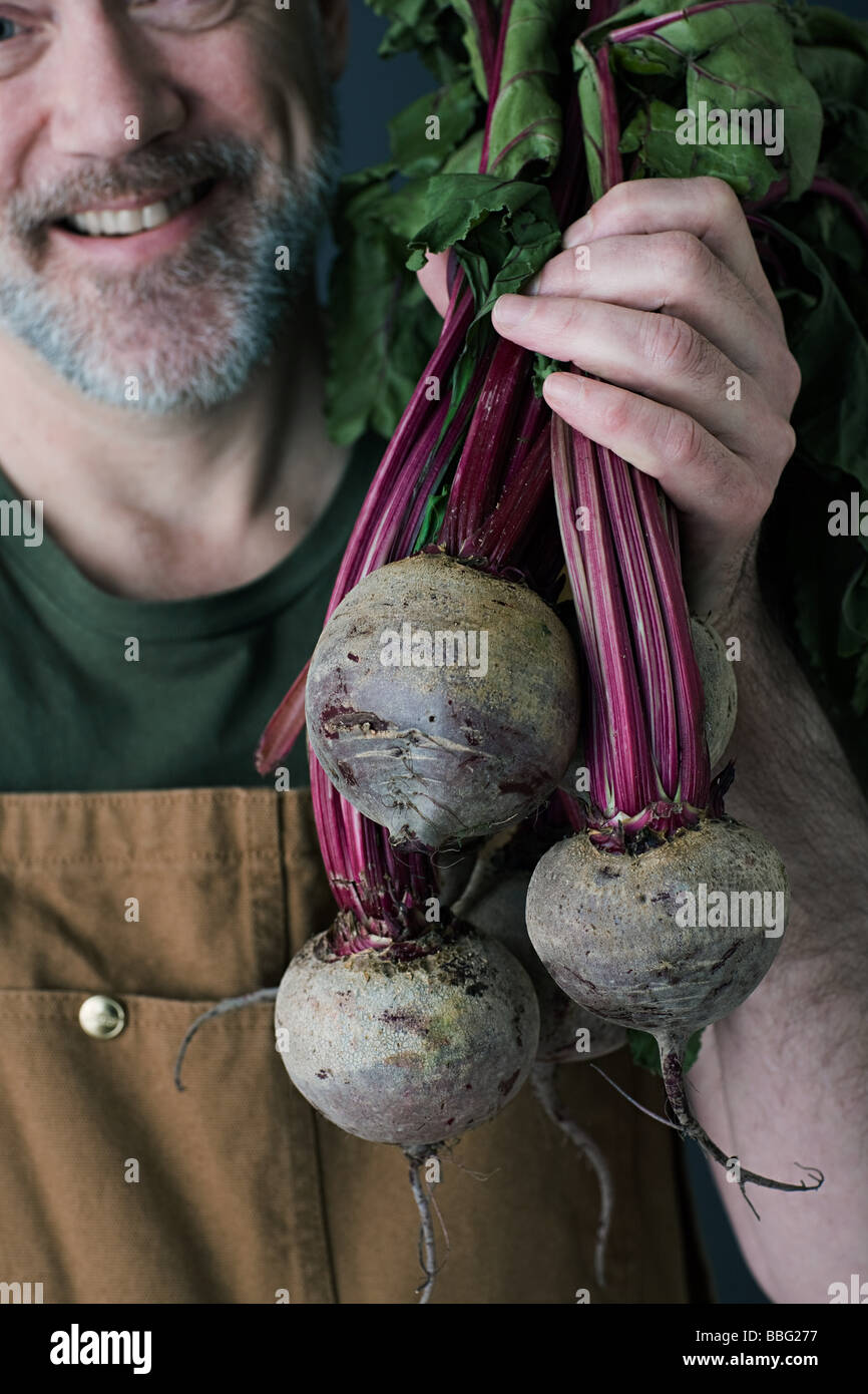 Man with beetroot Stock Photo - Alamy