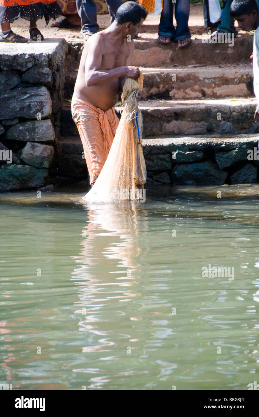 Fishing with a cast net or throw net in backwaters kerala, India Stock ...