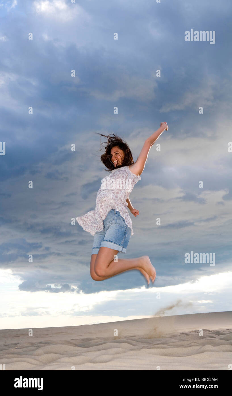 Young woman 24 jumping hi-res stock photography and images - Alamy