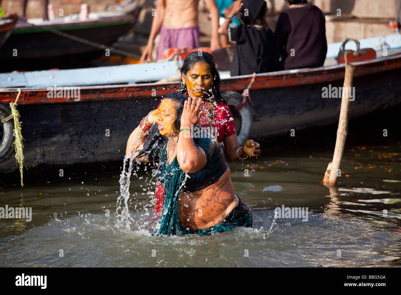 Bathing in the Ganges River in Varanasi India Stock Photo - Alamy