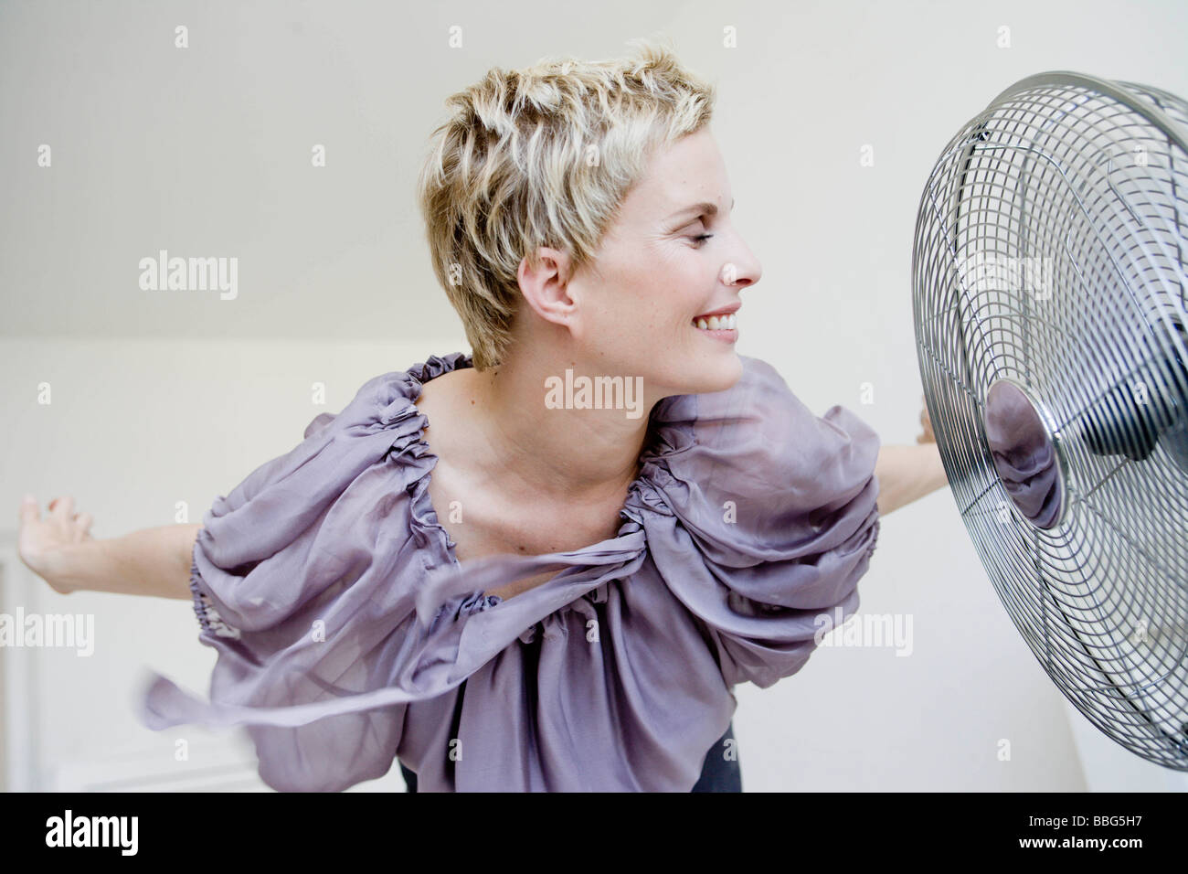 Fan blowing hi-res stock photography and images - Alamy