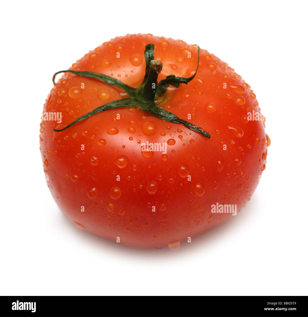 Water drop on tomato hi-res stock photography and images - Alamy