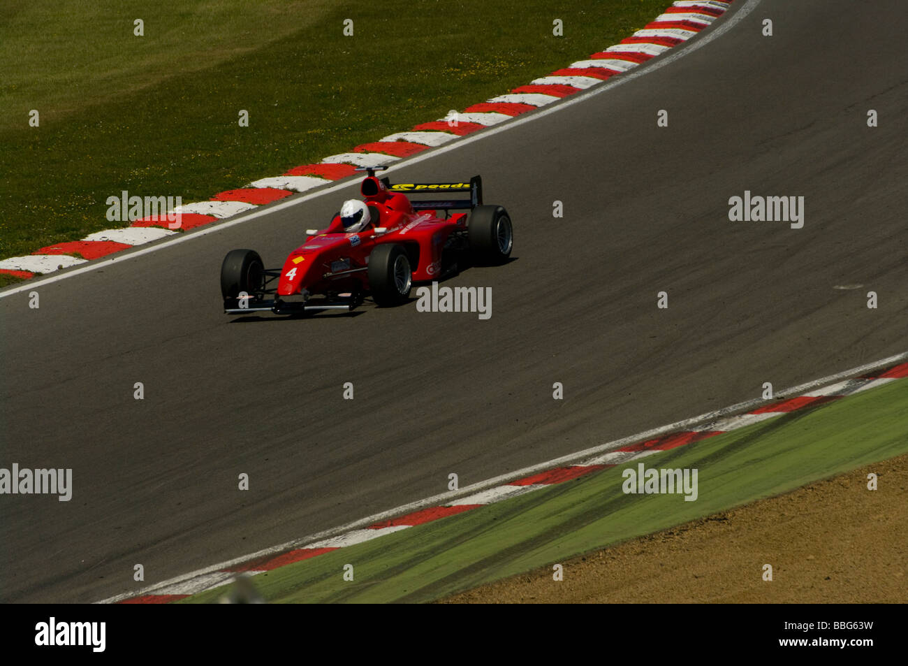 A Red Arrows Formula 1 Racing Car driven by Chris Woodhouse Rounding ...
