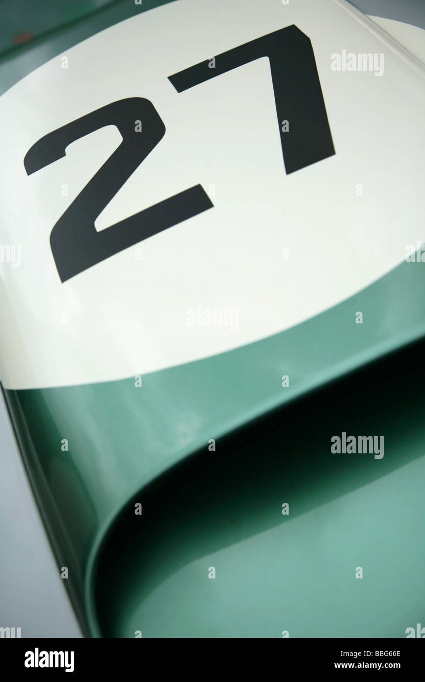 Number 27 in white circle on green background Stock Photo - Alamy