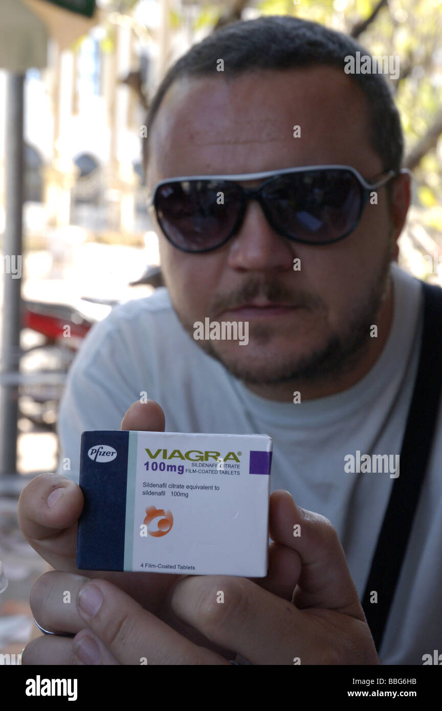 Man showing a Viagra box in his hands in Vientiane, Laos Stock Photo ...