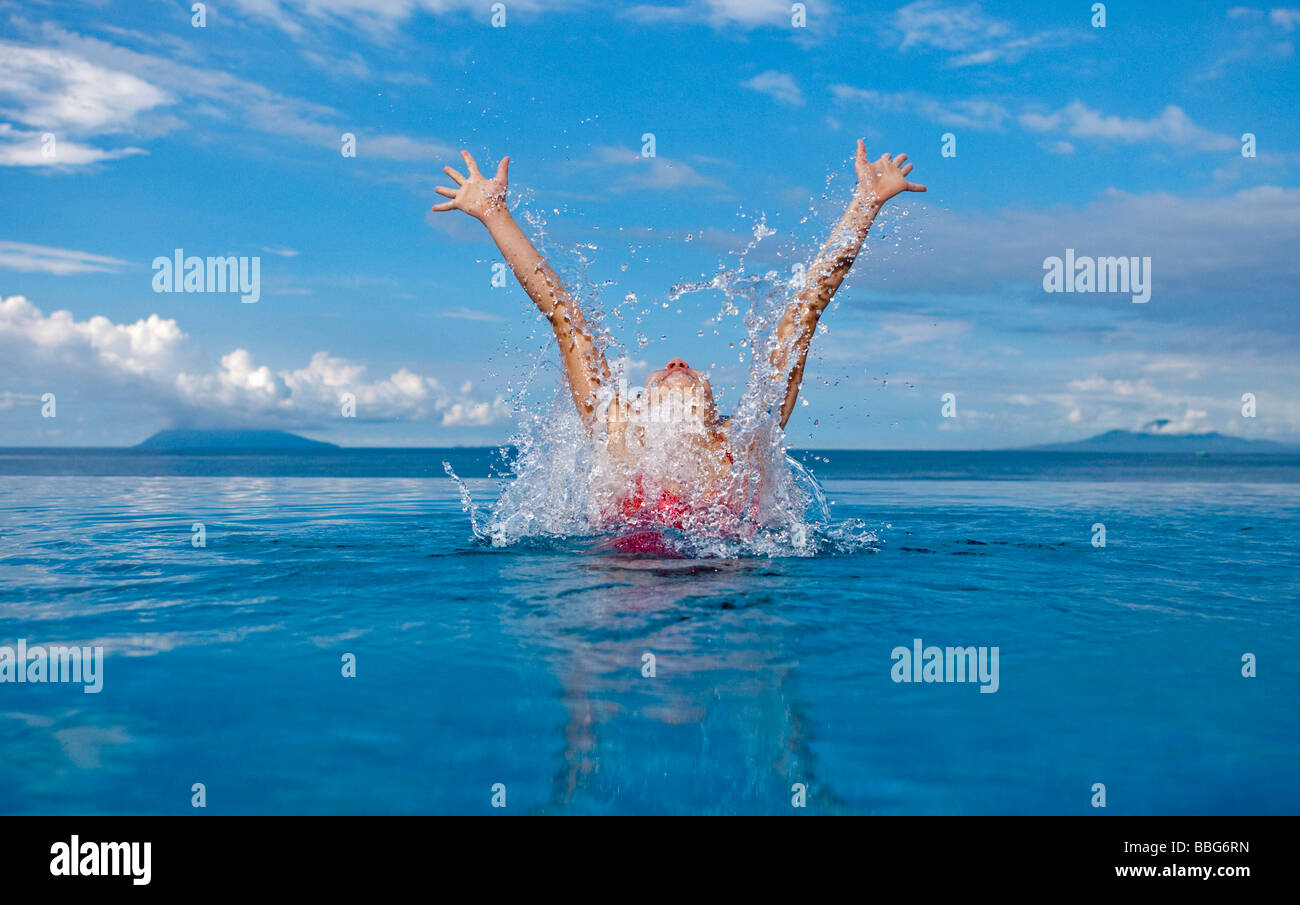 Kids Jumping Into Water, Blue Sky High Resolution Stock Photography and ...