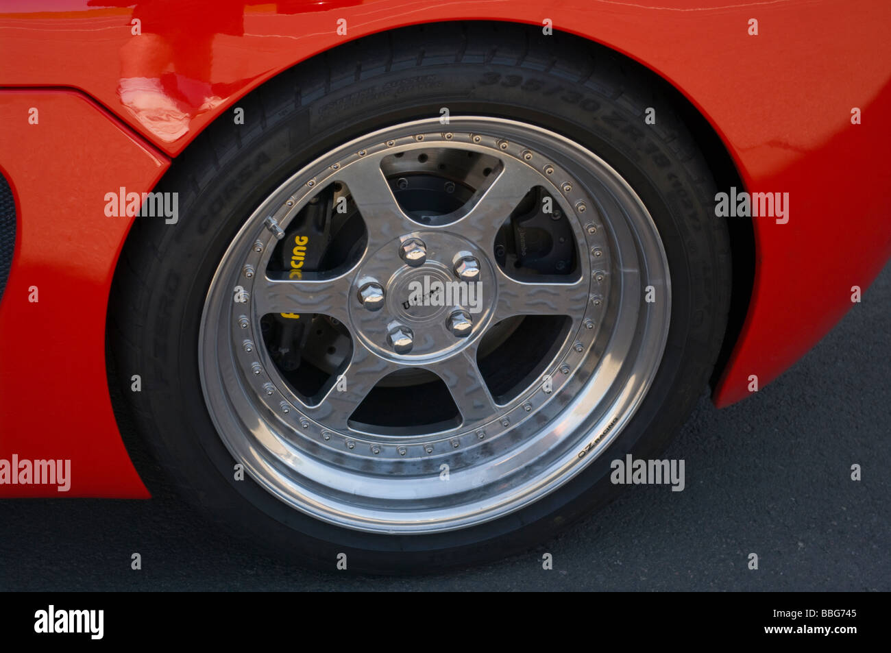 A Chrome Wheel On a A Red Ultima GTR Stock Photo - Alamy