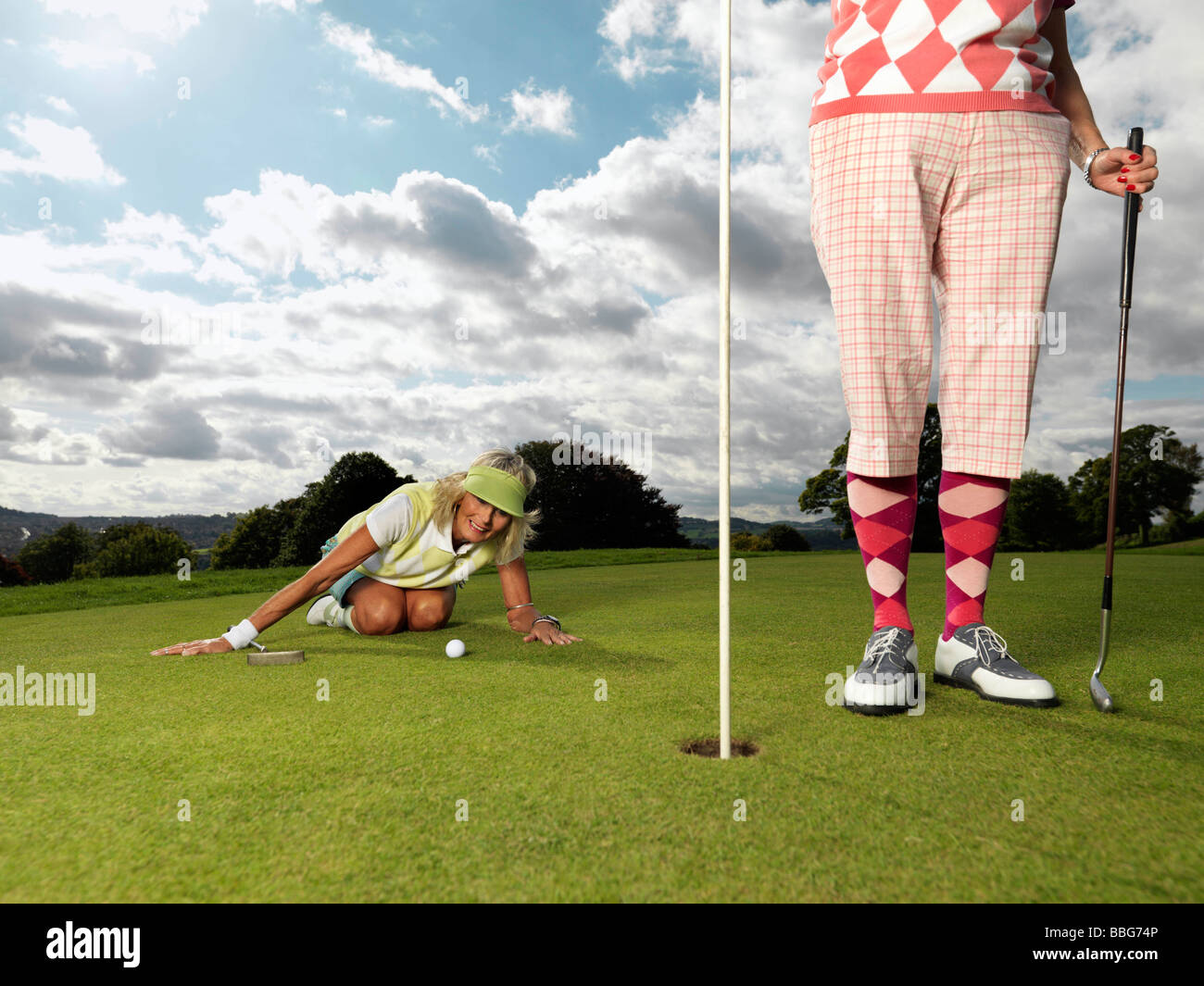 Ladies playing golf hi-res stock photography and images - Alamy