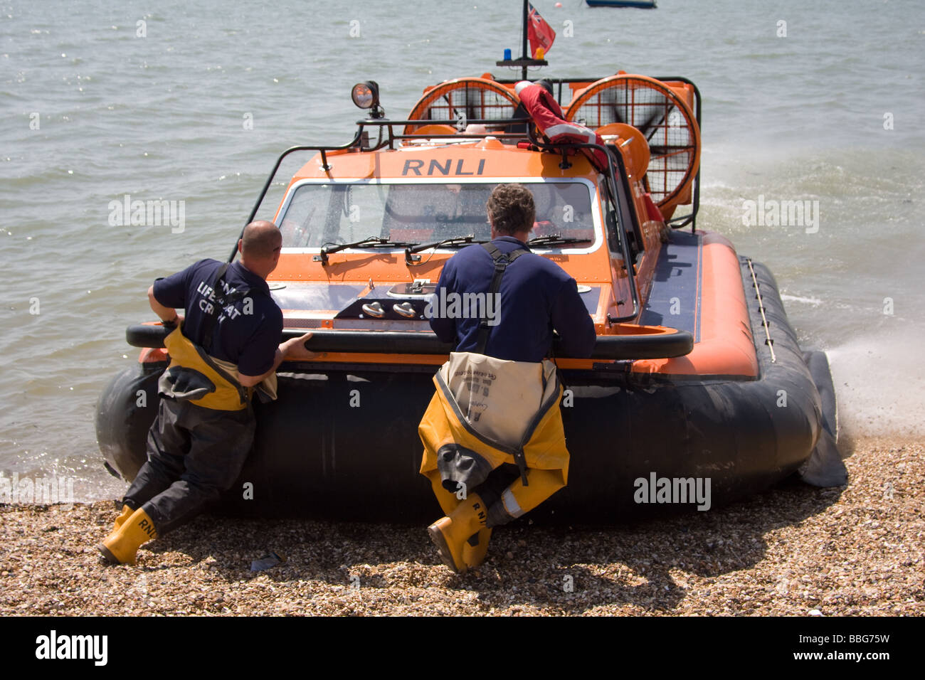 rnli orange hovercraft rescue service emergency crew low tide emergency ...