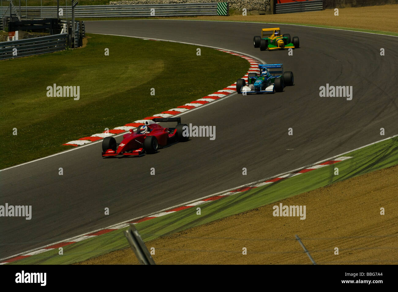 A Red Dallara Racing Car driven by Karl Heinz Becker leading A Blue ...