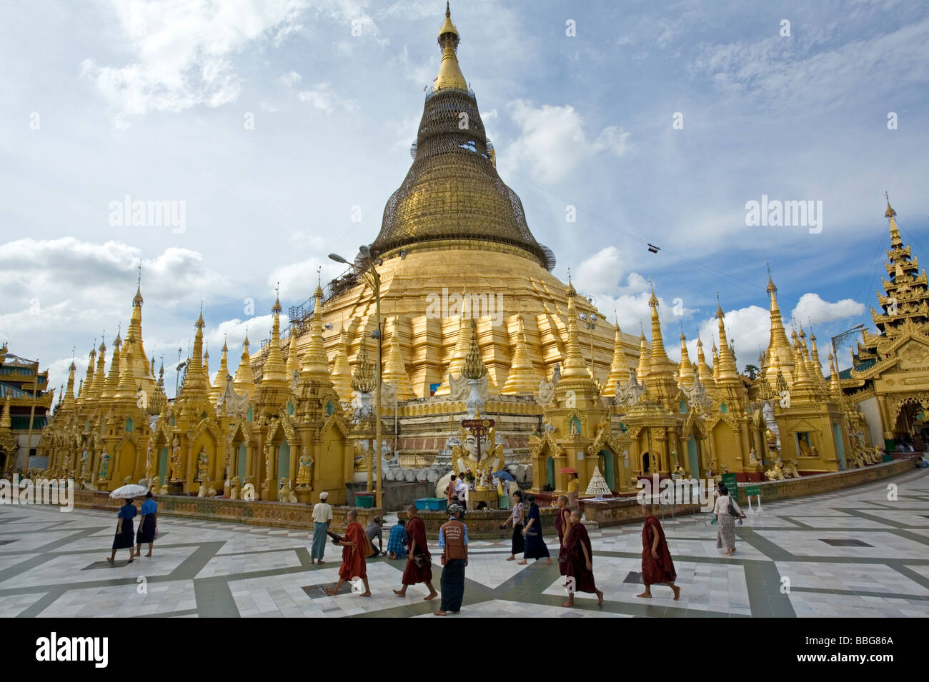 Devotees circumambulating Shwedagon pagoda. Yangon. Myanmar Stock Photo ...