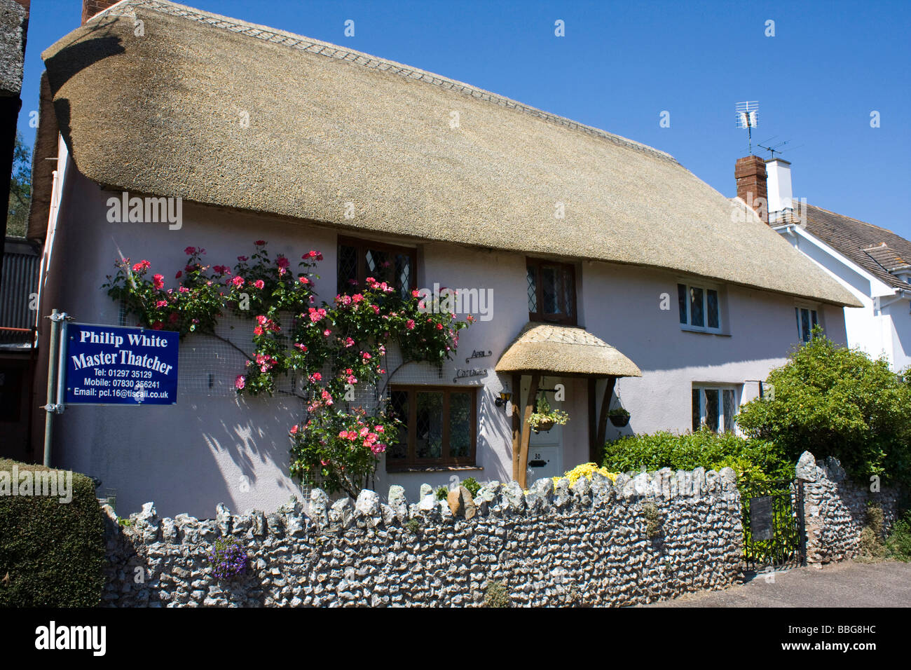 master thatcher re-roofing cottage roof south devon village otterton ...