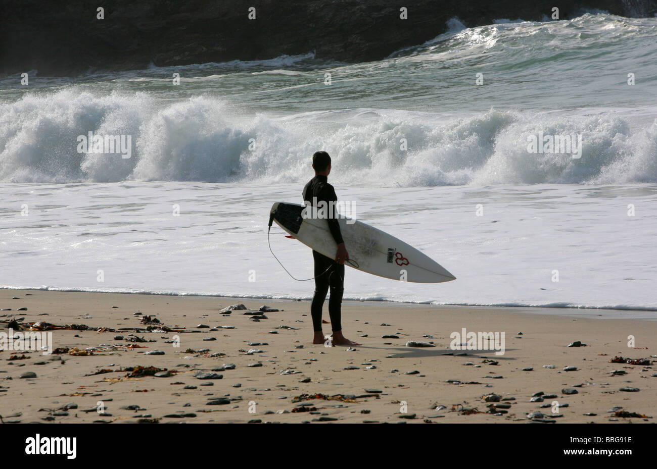 Surfer at Portreath beach, Cornwall, England, UK Stock Photo - Alamy