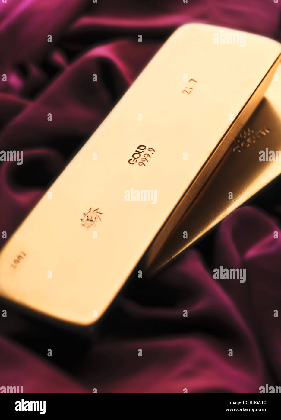 Fake gold bars with a made-up logo Stock Photo - Alamy