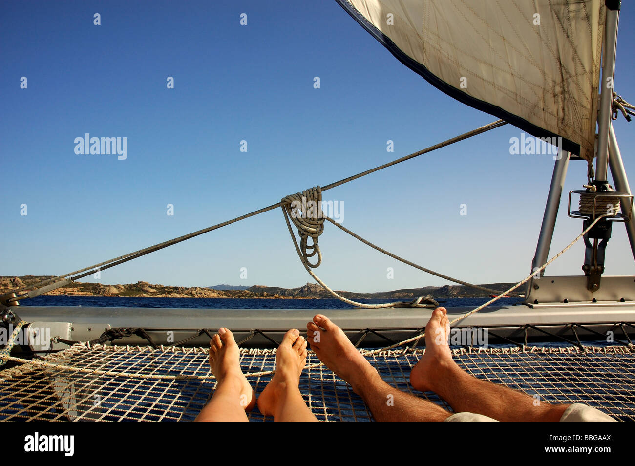 Relaxation on sailing catamaran Stock Photo - Alamy