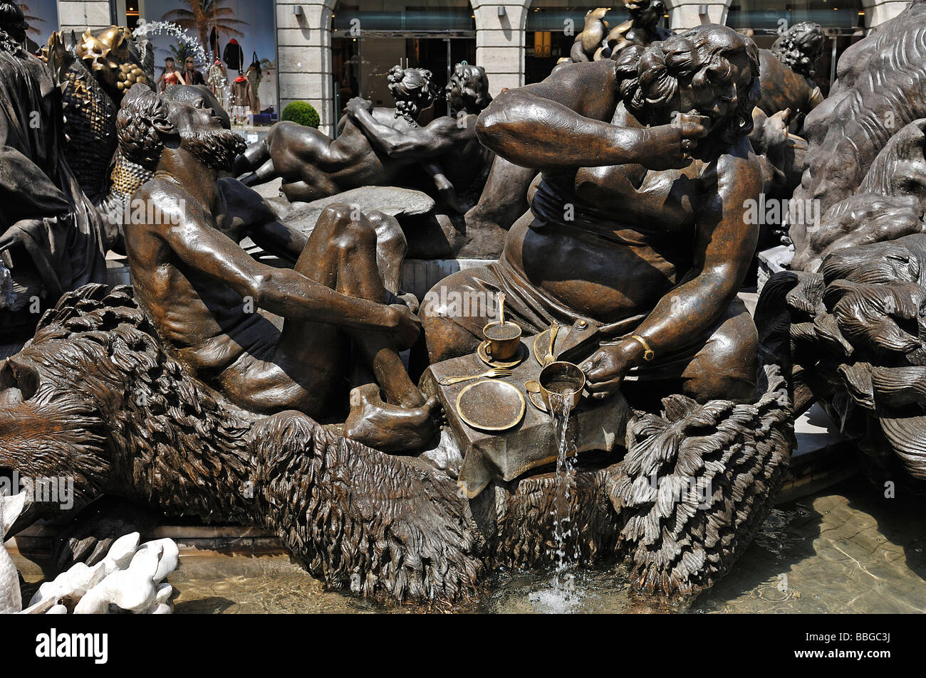 Fountain the "Ehekarussell", the marriage carousel, couple drinking ...