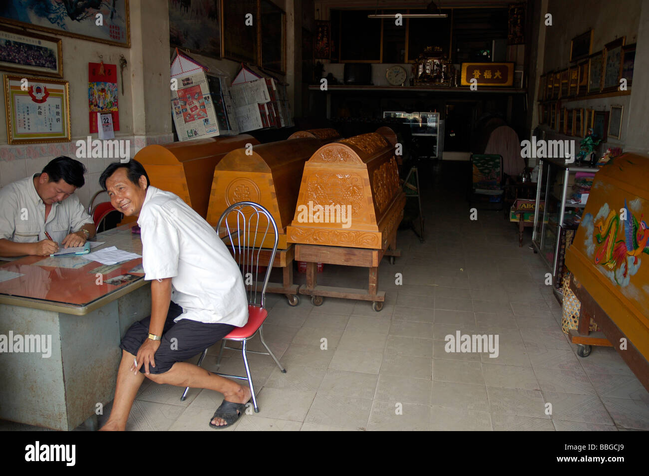Inside a chinese store selling coffins in Phnom Penh, Cambodia Stock ...