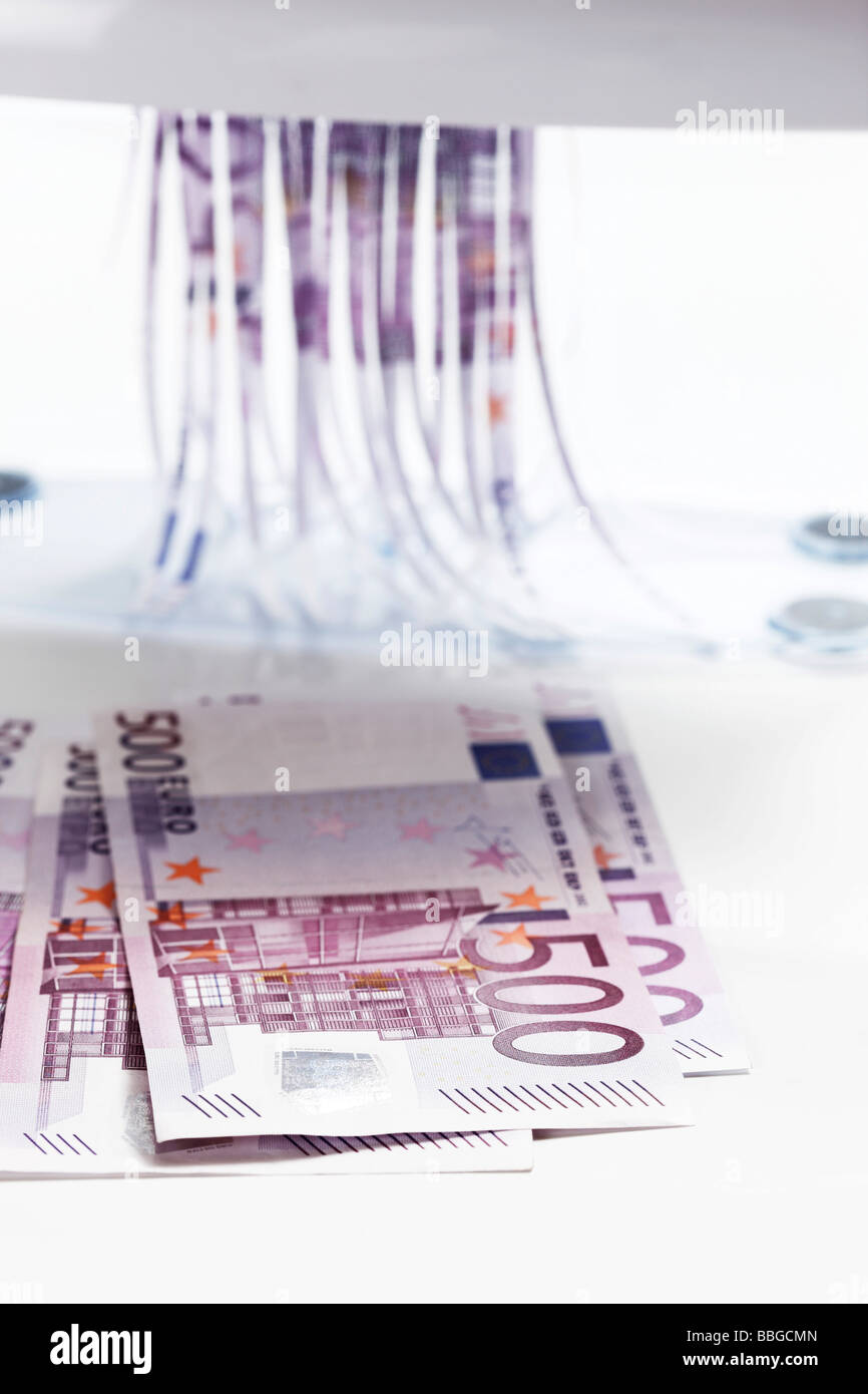 Shredder with euro banknotes Stock Photo - Alamy