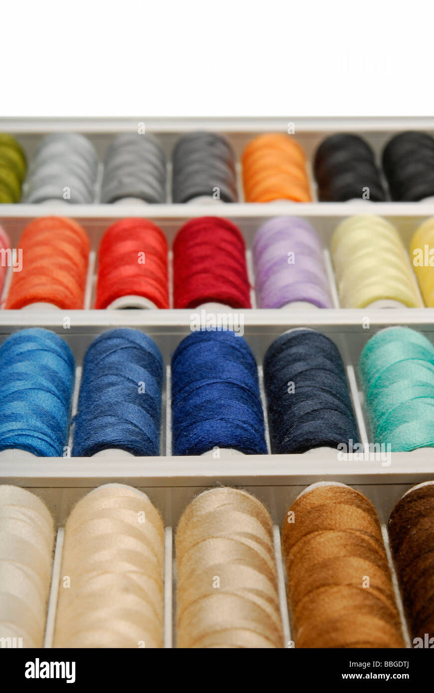 Spools of thread in various colours Stock Photo - Alamy