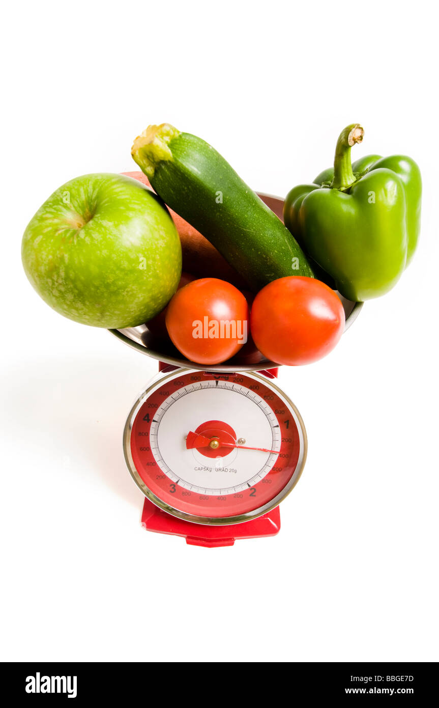 Fruits on weighing scale Cut Out Stock Images & Pictures - Alamy