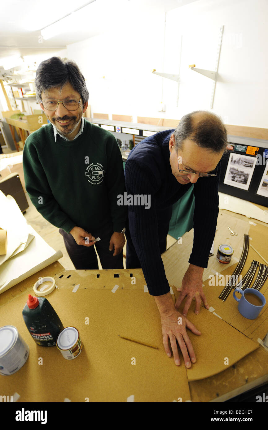 Colin Benjamin and David Cousins working on their Purleigh layout Stock ...
