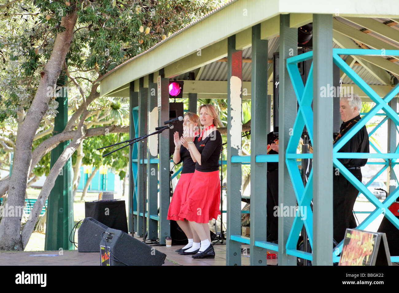 Rock and roll singers at an outdoor concert Stock Photo - Alamy