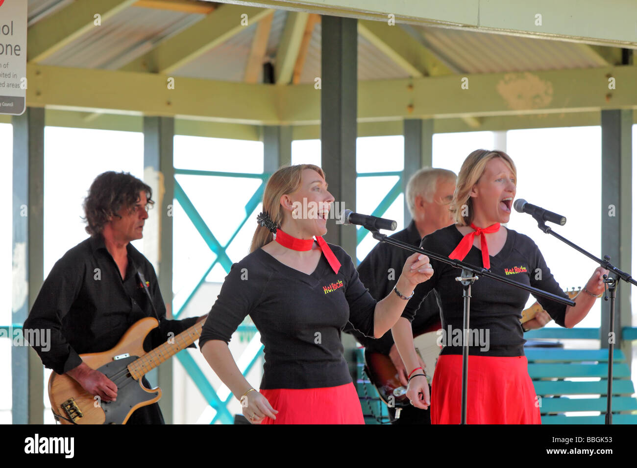 Rock and roll singers at an outdoor concert Stock Photo - Alamy