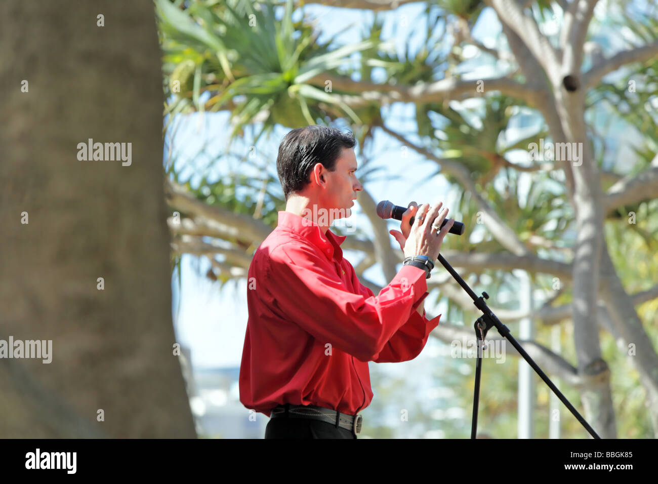 Rock and roll singes at an outdoor concert Stock Photo - Alamy