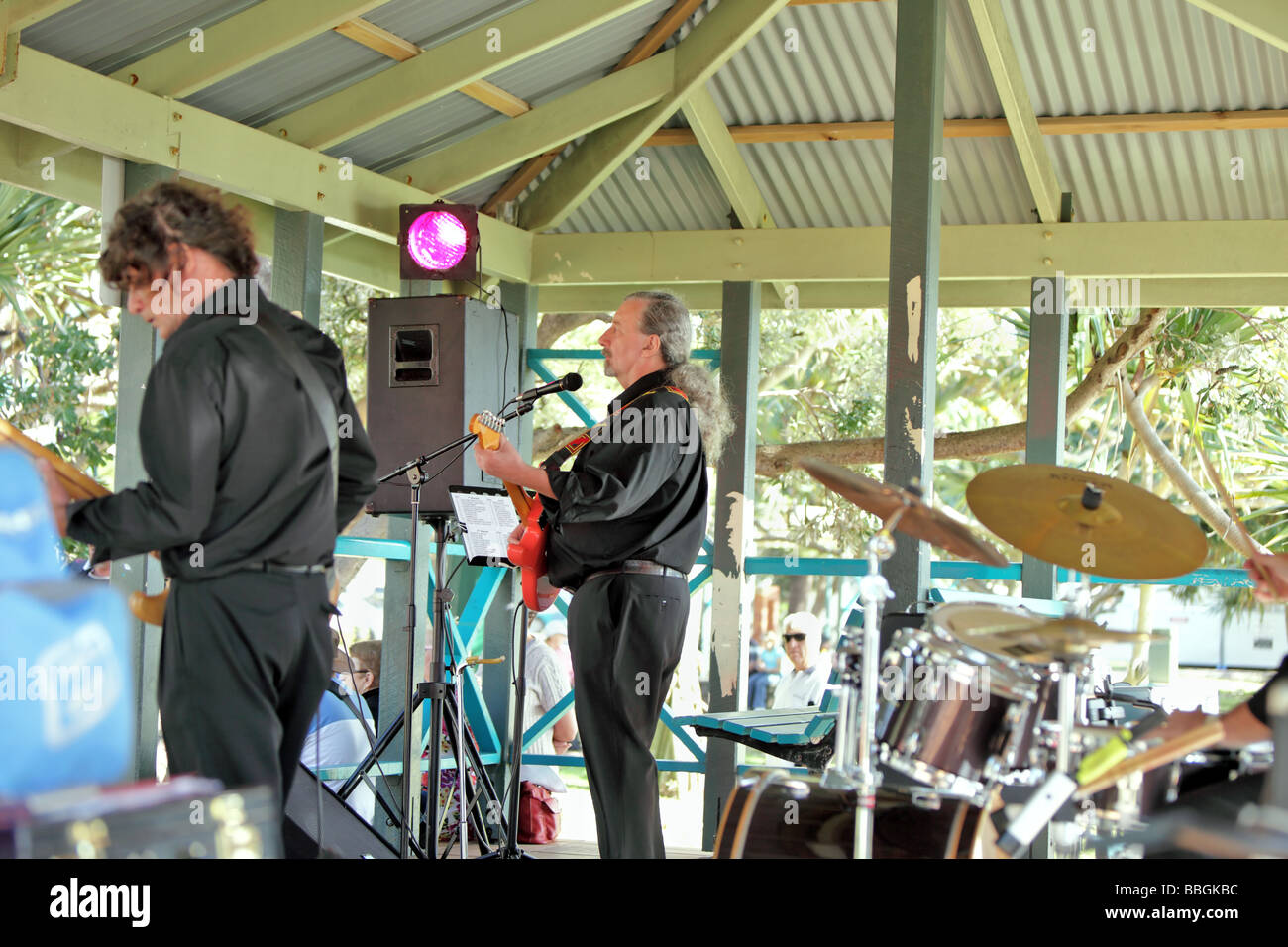 Rock and roll musicians at an outdoor concert Stock Photo - Alamy