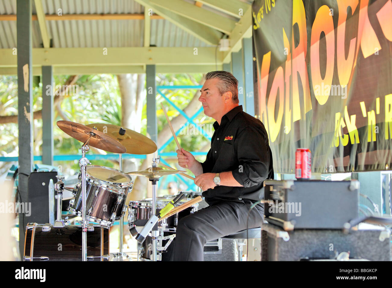 Drummer playing rock and roll Stock Photo - Alamy