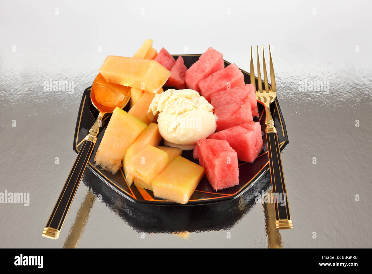 Water melon and rock melon with vanilla ice cream on a plate Stock ...