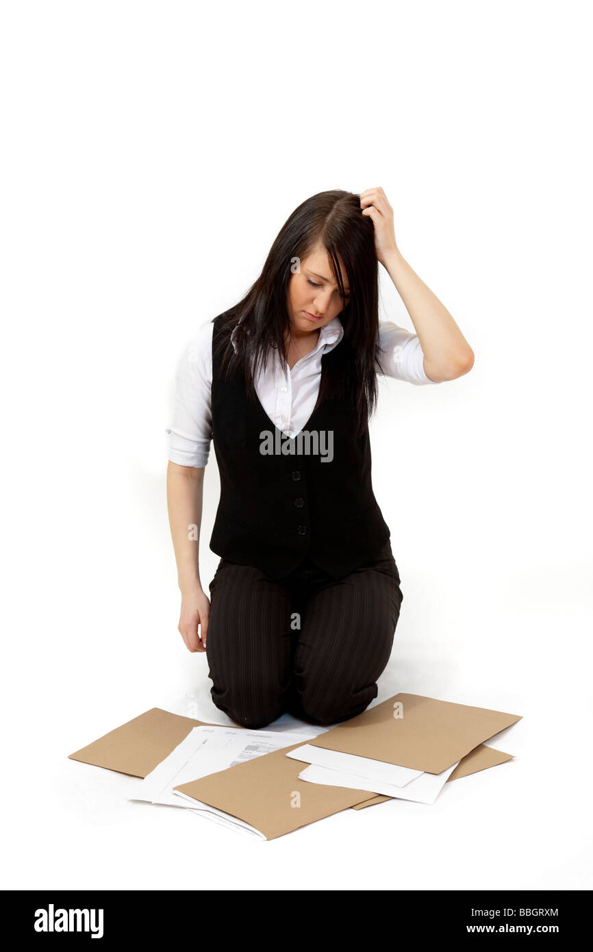 Attractive young brunette business woman looking a files Stock Photo ...