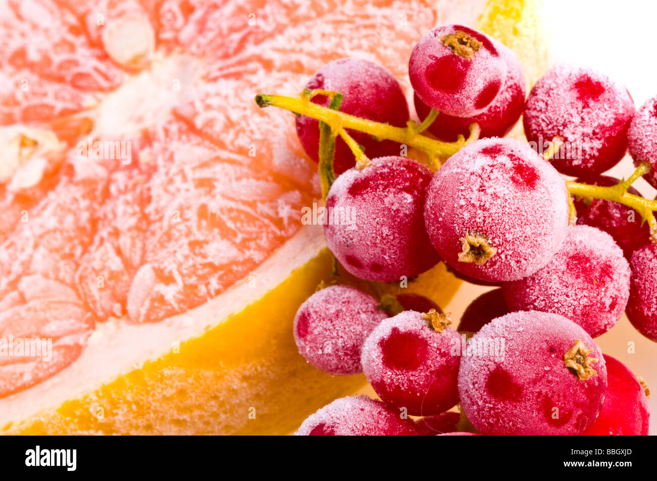 fresh frozen fruit in ice Stock Photo - Alamy