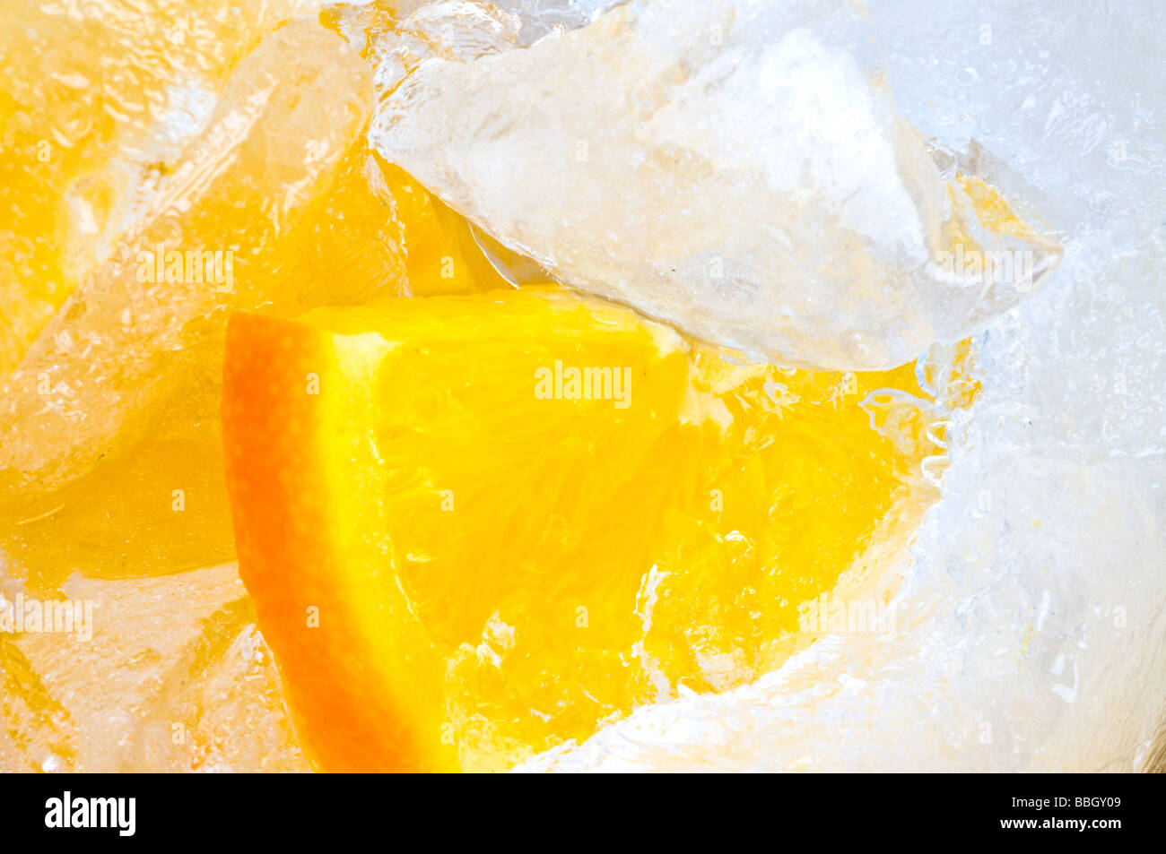 fresh frozen fruit in ice Stock Photo - Alamy