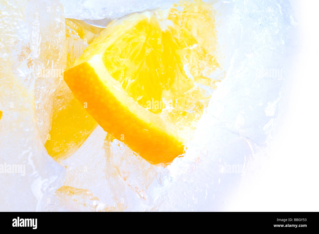 fresh frozen fruit in ice Stock Photo - Alamy