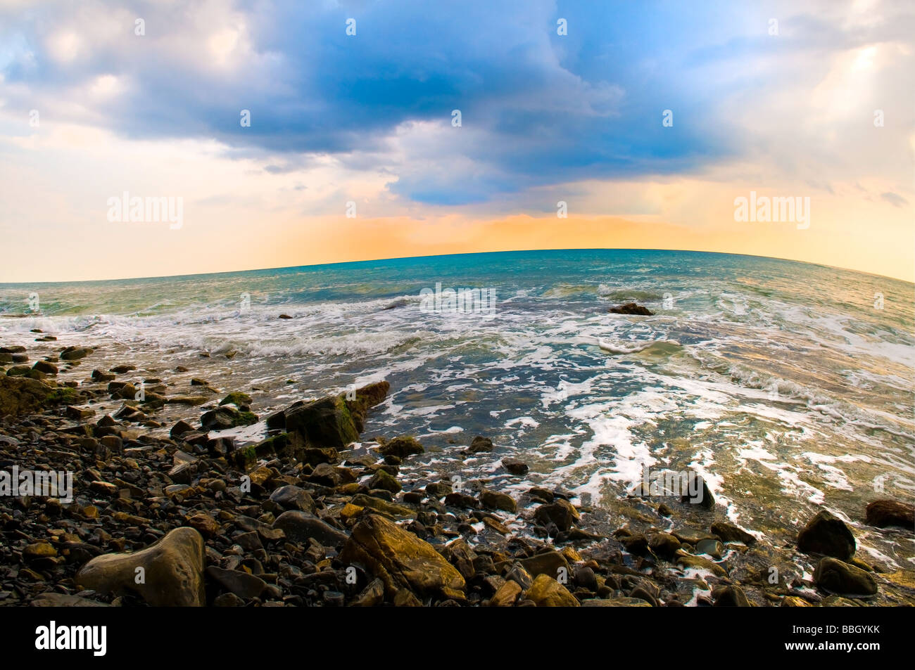 Blue sky over water Stock Photo - Alamy