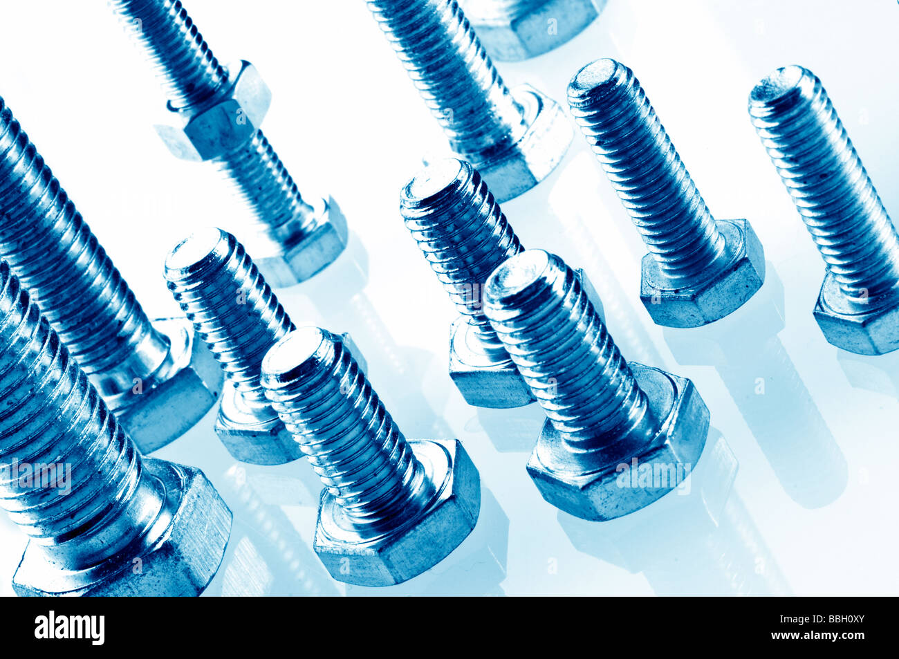 Bolts and nuts in blue tones Stock Photo - Alamy