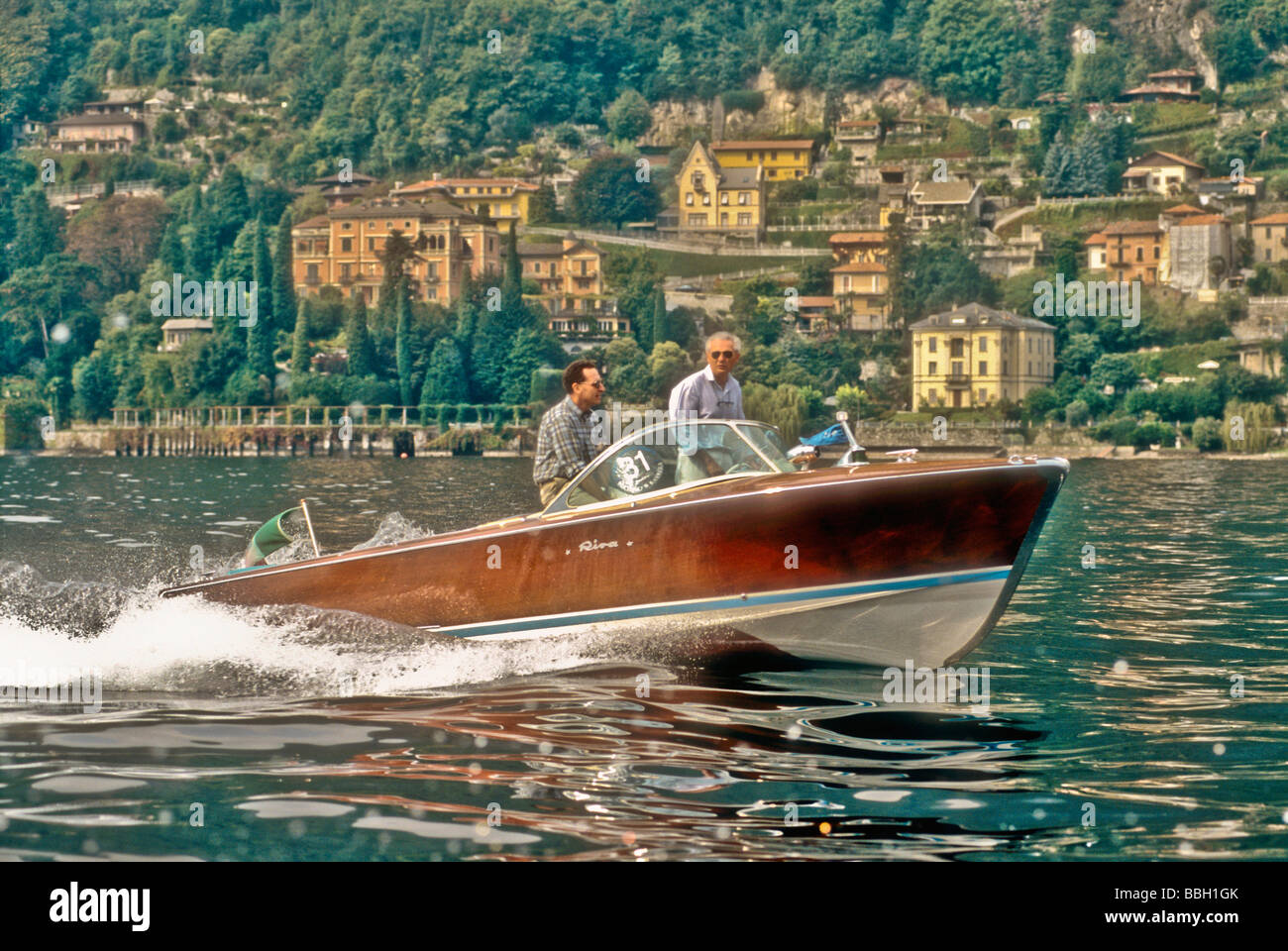 Fast Riva speedboat motorboat underway on Lake Como Lombardia Stock ...