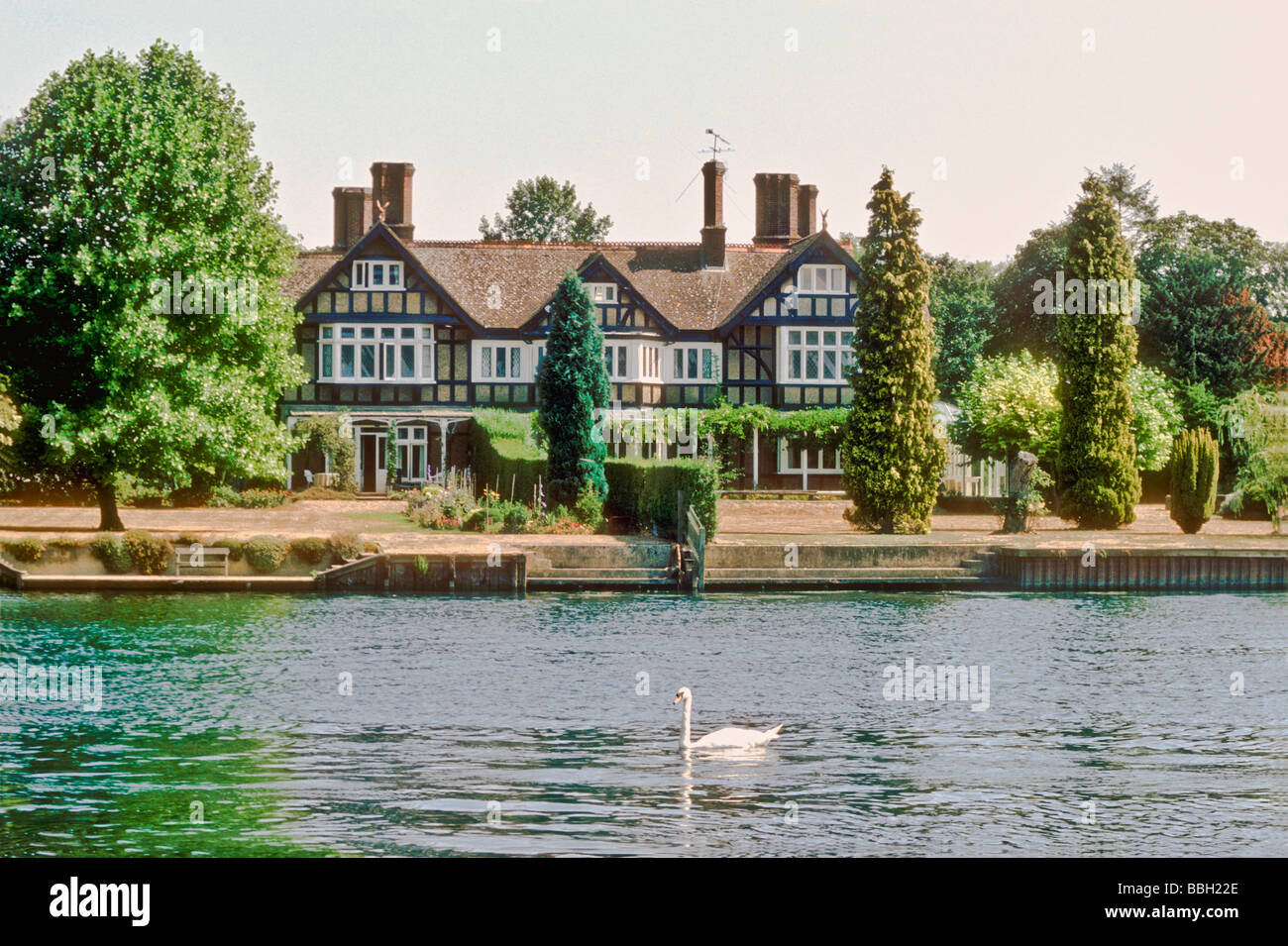 A large house on the River Thames at Remenham in Berkshire England UK ...