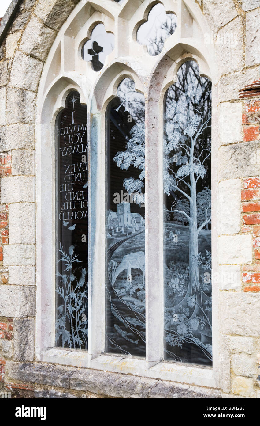 An ornate etched window depicting the surrounding area. Church of St ...