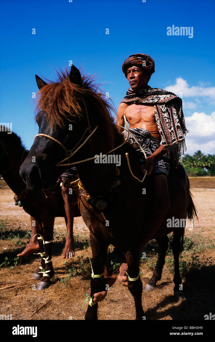 Sumbawa, Indonesia; Tribesman on horseback Stock Photo - Alamy