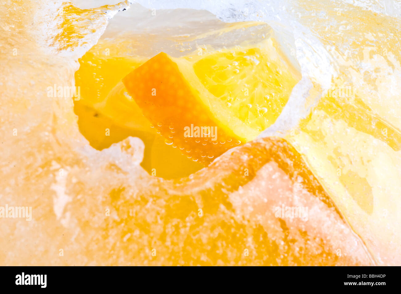 fresh frozen fruit in ice Stock Photo - Alamy