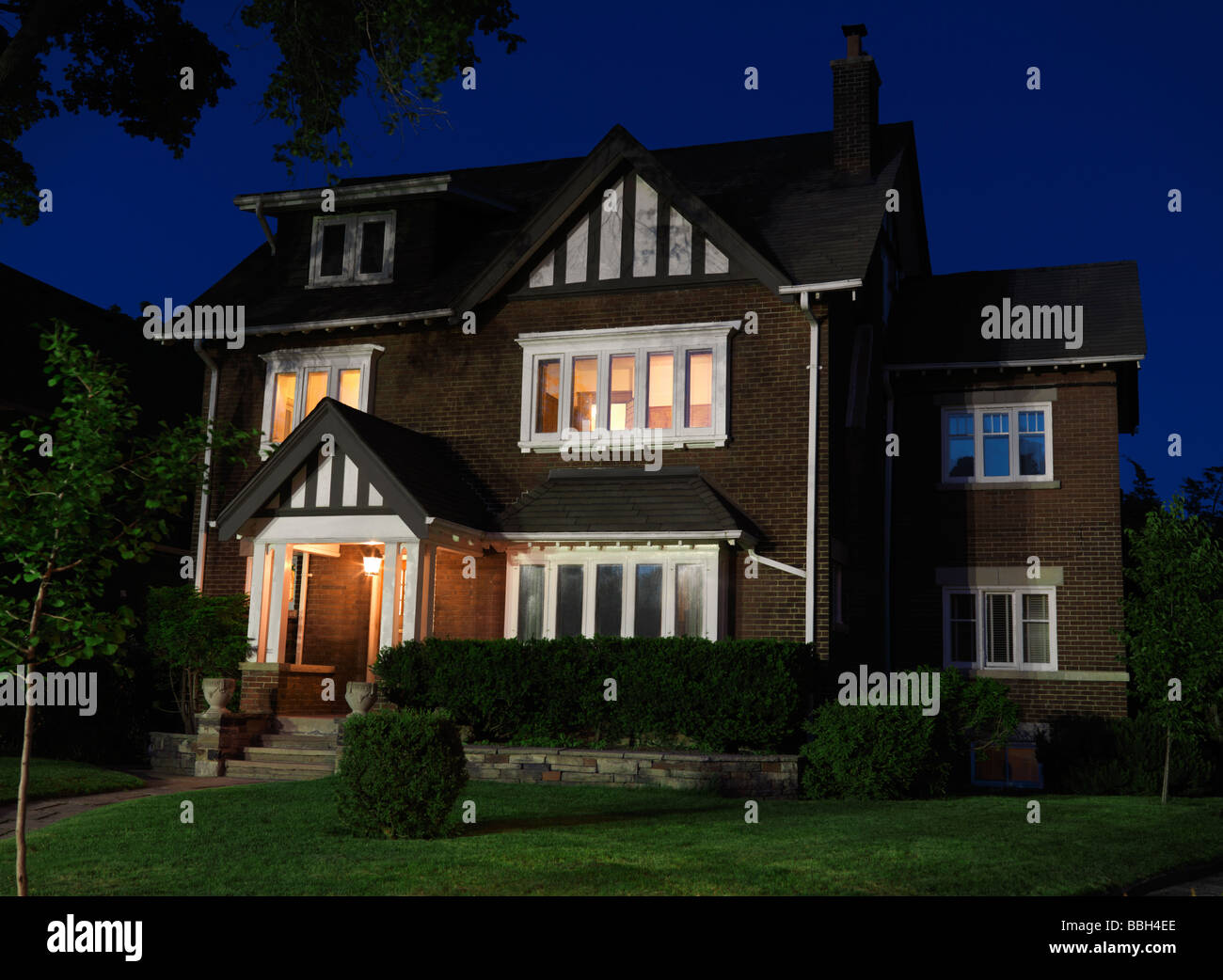Beautiful family house nighttime scenery Stock Photo - Alamy